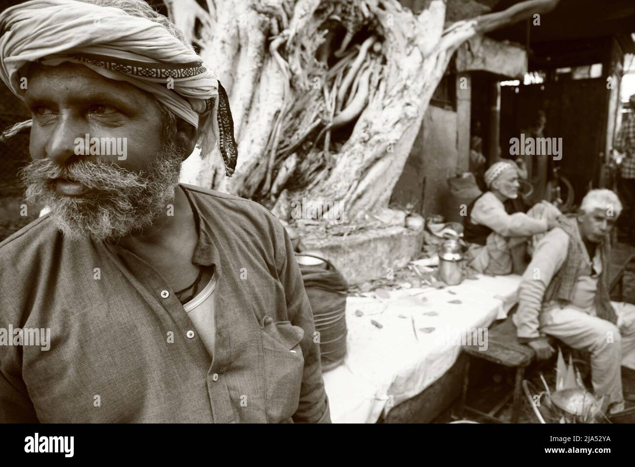 India, Uttar Pradesh, Benares (Varanasi). Portraits of Indian men from ...