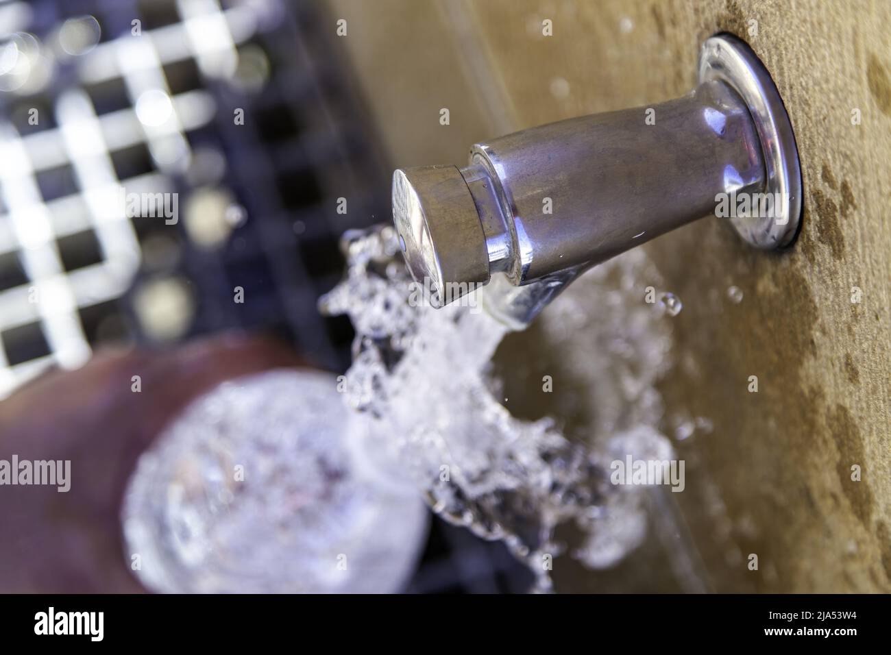 Filling water bottle in fountain, water and summer, refreshment Stock ...