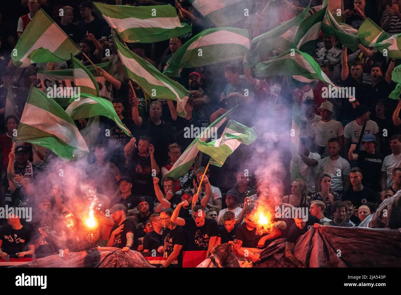 TIRANA, ALBANIA - MAY 25: Feyenoord ultras fans set up flares display ...