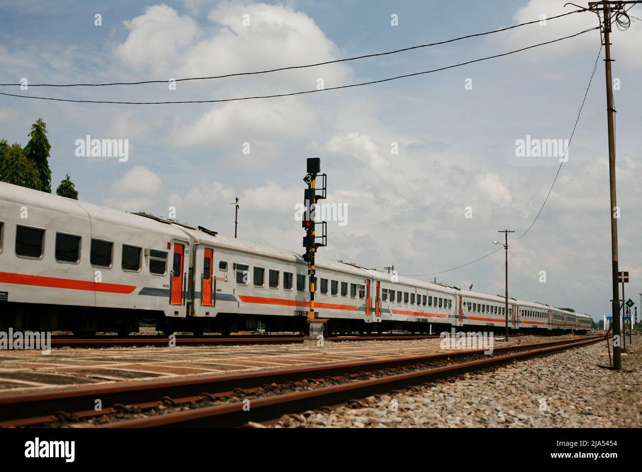 Passanger train stopped at station in Java Island Indonesia waiting to ...