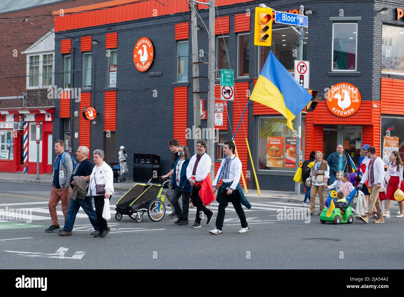 Toronto, ON, Canada – May 19, 2022: People in Ukrainian national ...