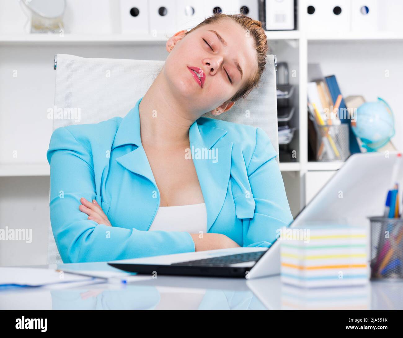 Female employee is sleeping after productive day at work Stock Photo ...