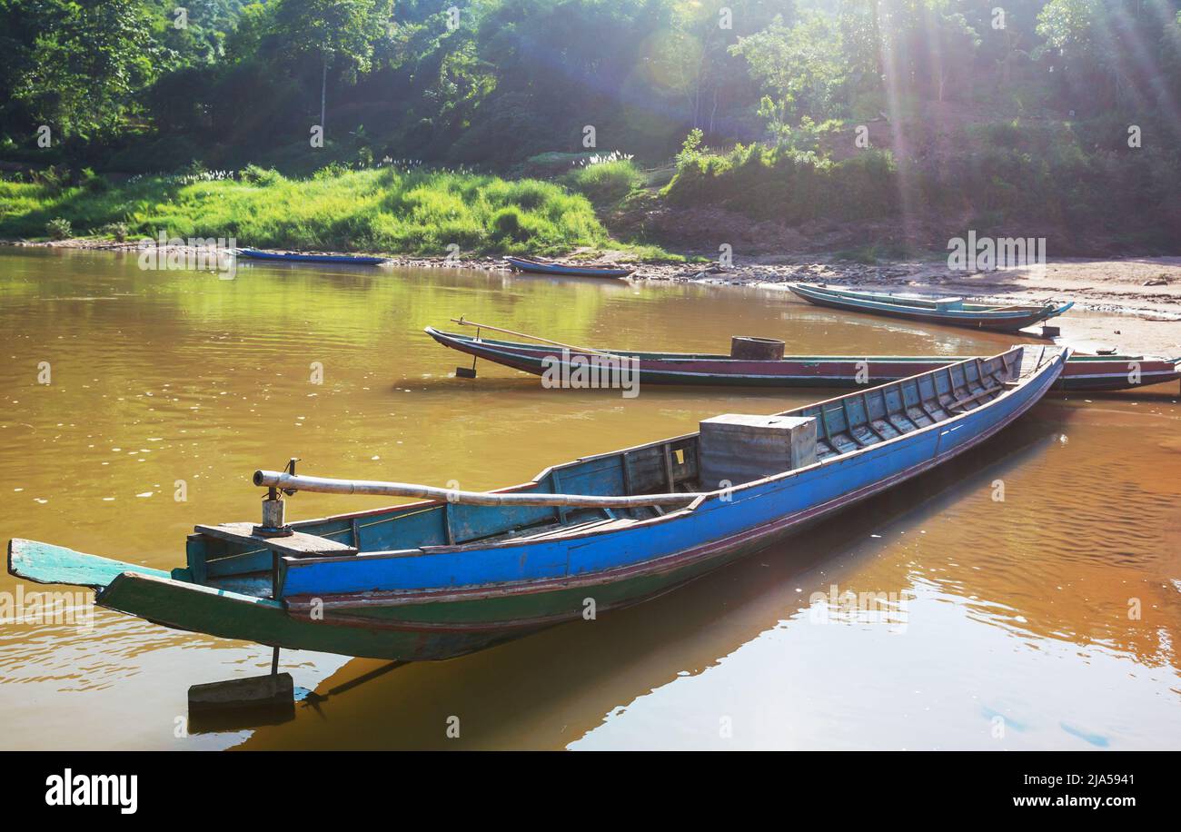 Traditional lao boats hi-res stock photography and images - Alamy