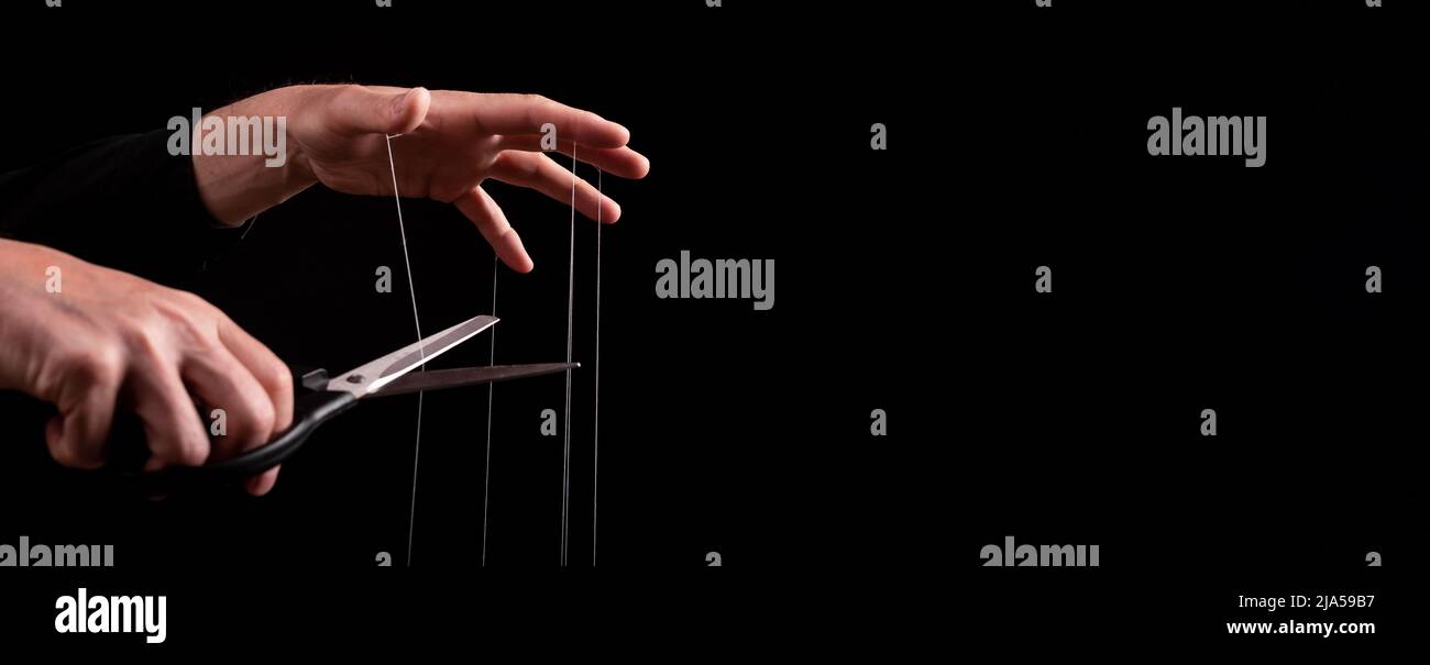 Banner with man cutting strings on hands with scissors. Abuse, violence ...