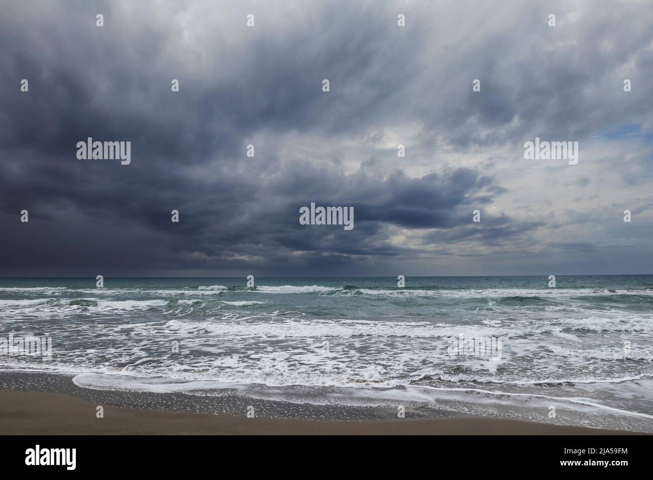 rain weather above sea beach Stock Photo - Alamy