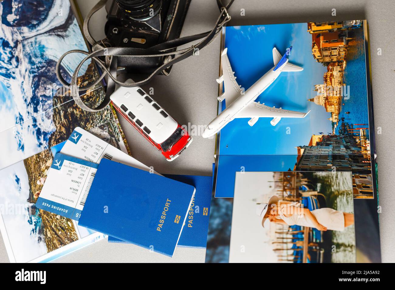 Passport and plane with holiday travel ideas Stock Photo - Alamy