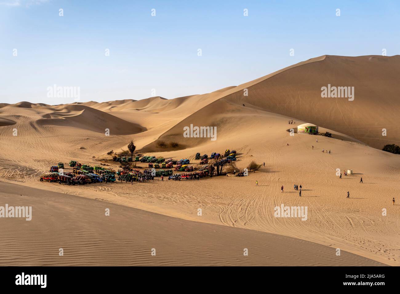 Visitors Making Their Way Over To The Dune Buggies At The Desert Oasis ...