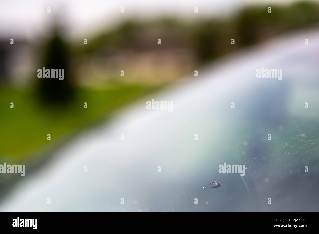 Chip in the glass windshield of a vehicle Stock Photo - Alamy