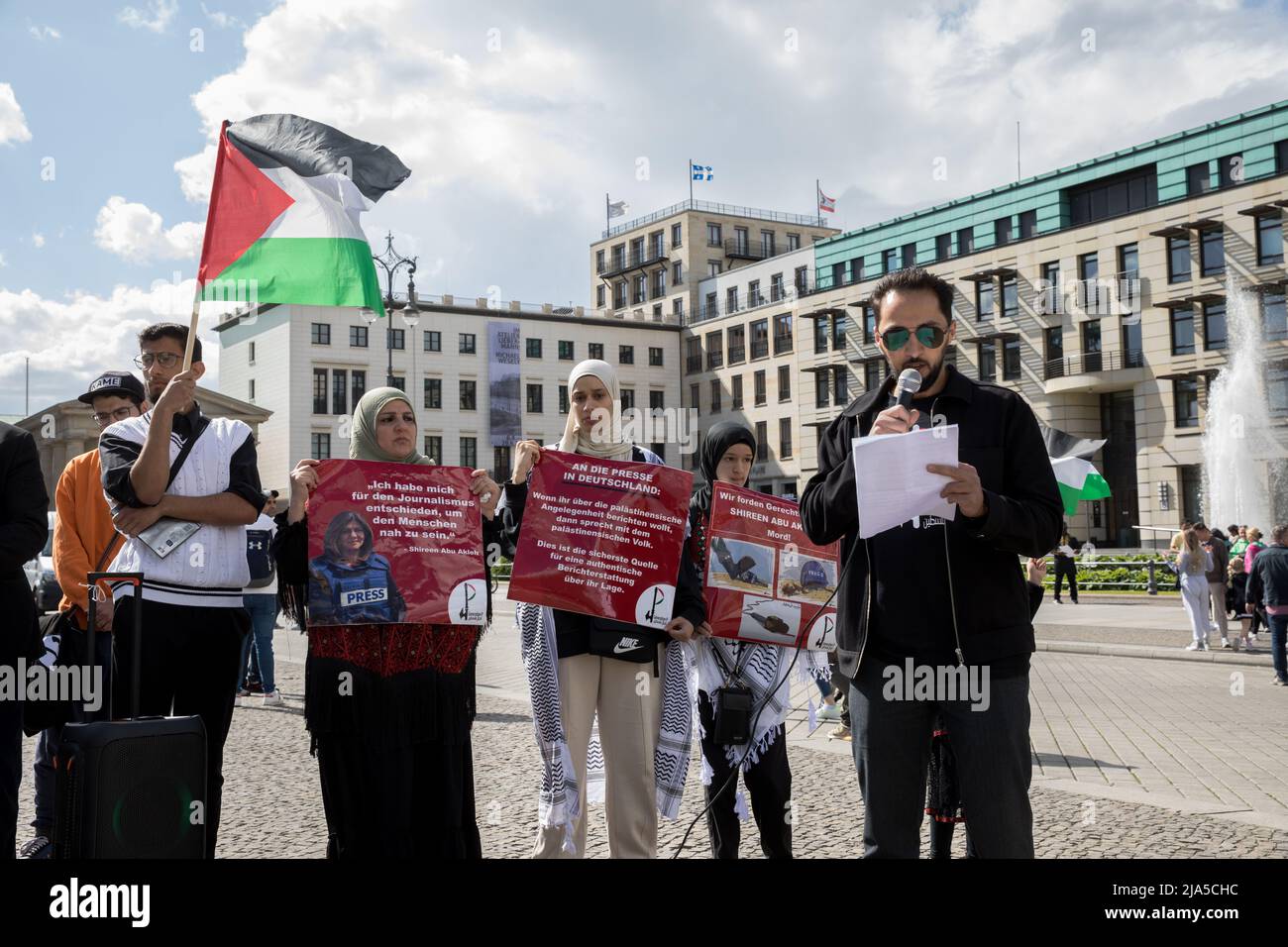 Protesters in front of the Brandenburg Gate at Pariser Platz in Berlin ...