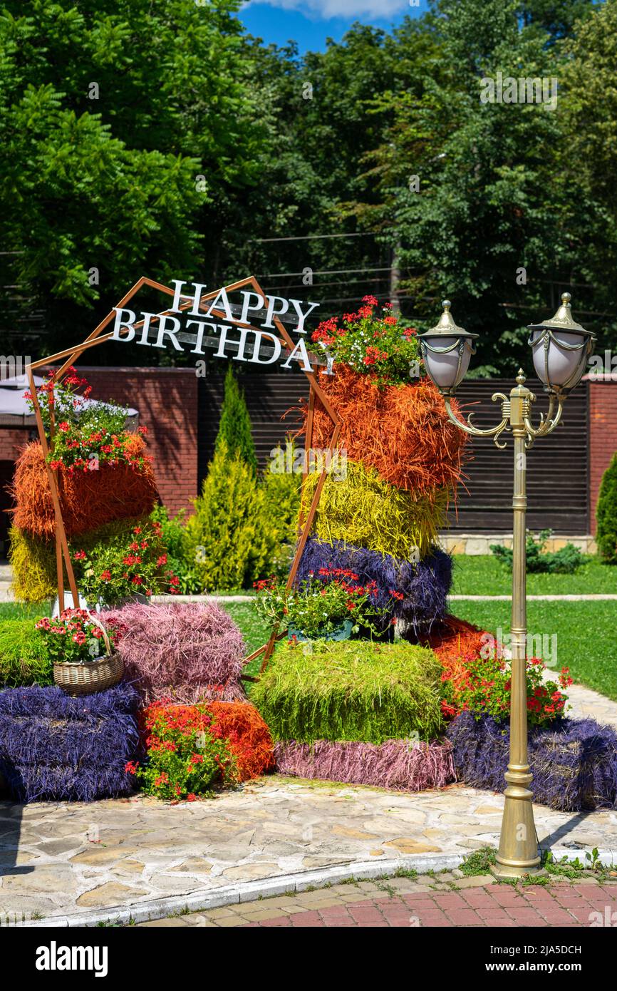 Happy birthday photo area made of natural hay bales painted in ...