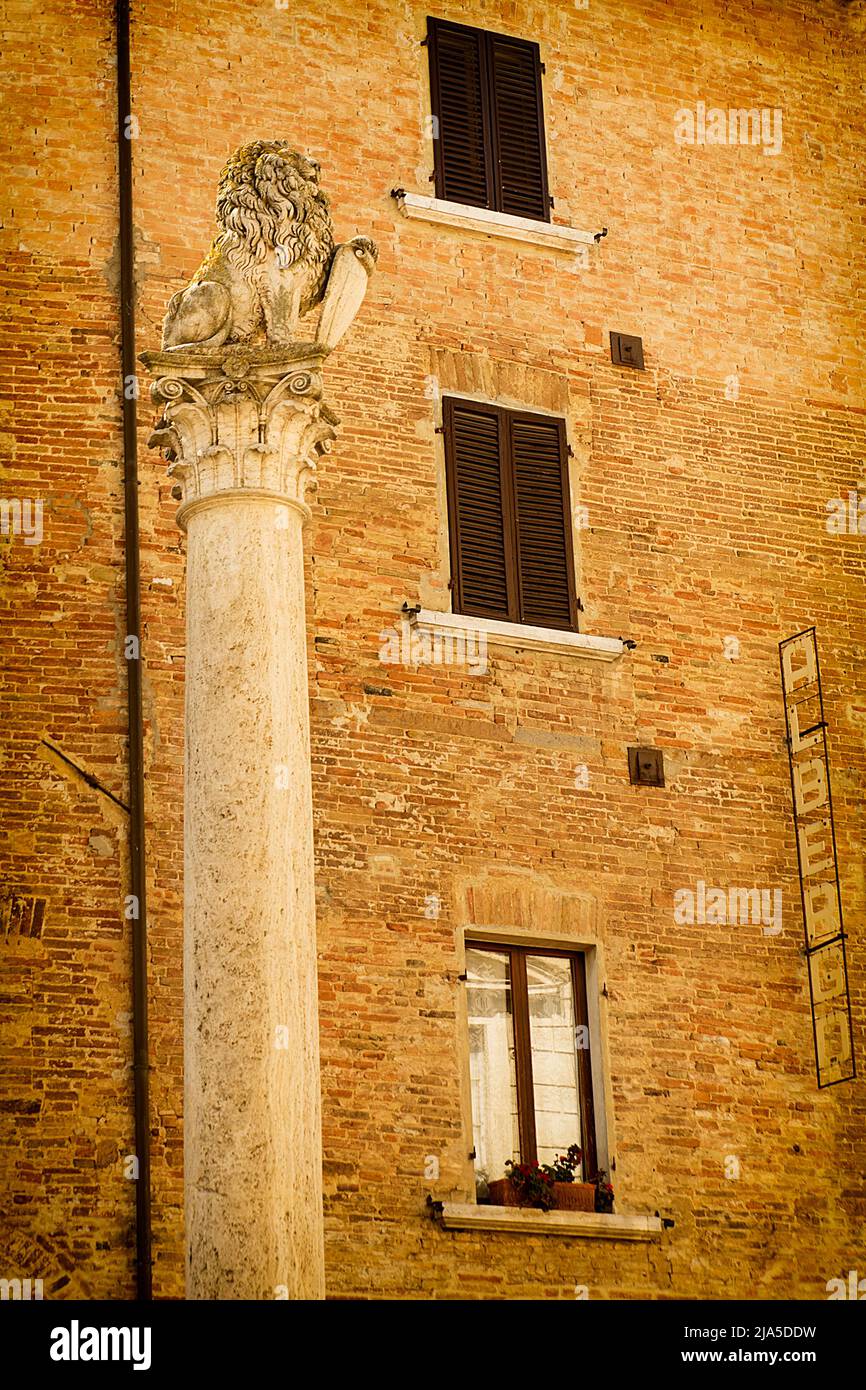 Ancient column in a street of Montepulciano, Tuscany - Italy Stock ...