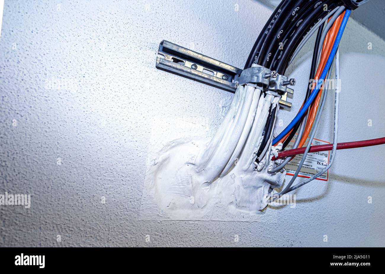 Fire barrier in a wall with cable duct Stock Photo - Alamy