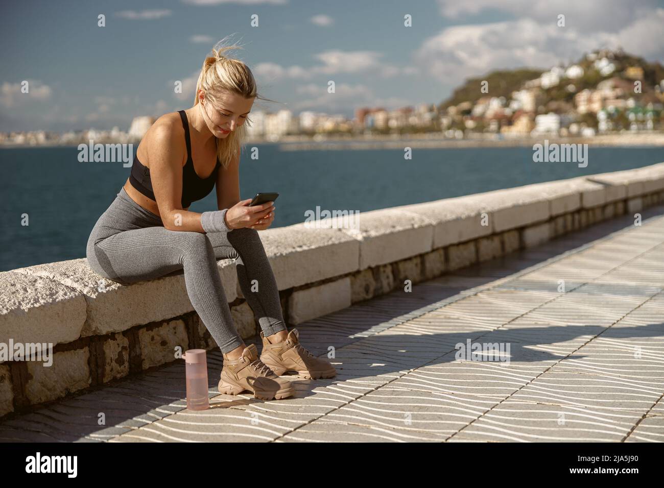 Caucasian fit female engaged in sports at sea Stock Photo - Alamy