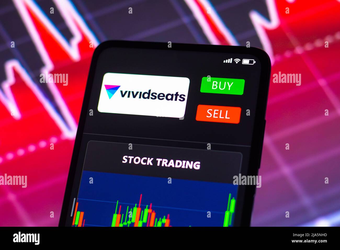 In this photo illustration the stock trading graph of Vivid Seats seen ...