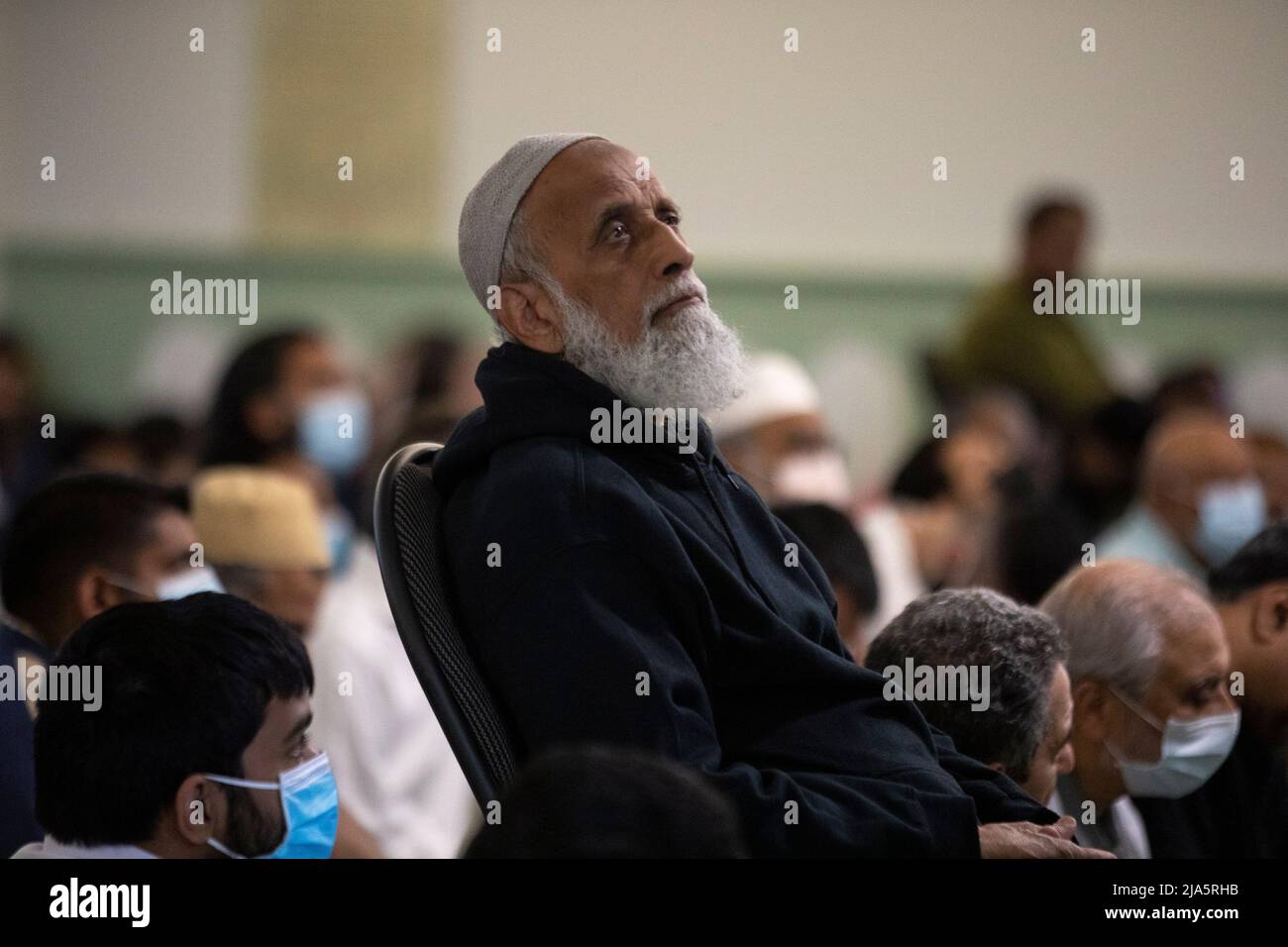 A worshiper listens to a sermon at ISNA Mosque in Mississauga, Ont., on ...