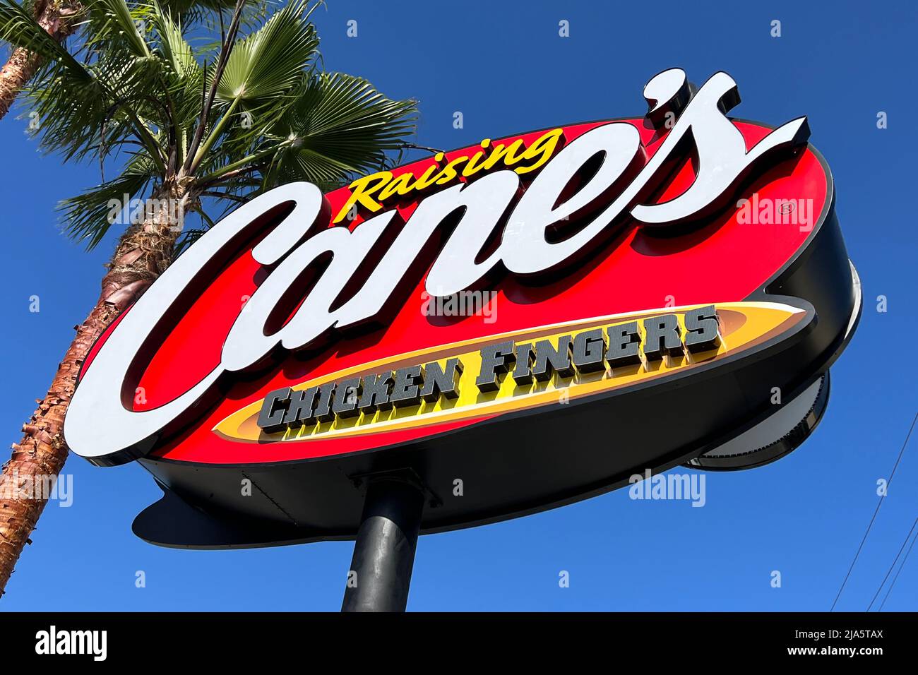 A raising canes chicken fingers fast food restaurant sign hi-res stock ...