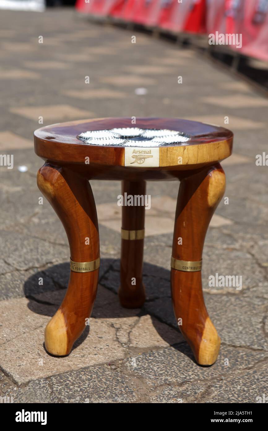 A three legged stool in honor of Arsène Wenger, former Arsenal manger ...