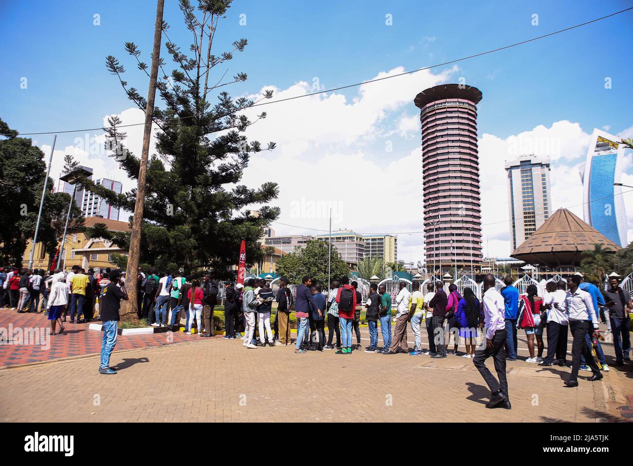 Kenyan soccer fans queue to view the trophy during the FIFA World Cup ...