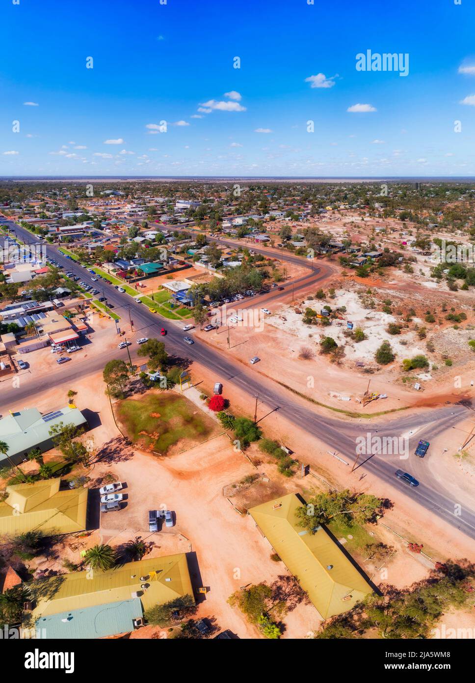 Vertical aerial panorama over main shopping street of Lightning ridge ...