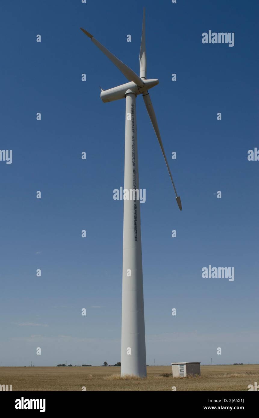 wind power turbine with blue sky background. clean, renewable and ...