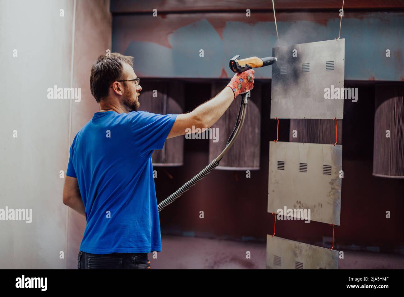 Industrial painter paints metal hi-res stock photography and images - Alamy