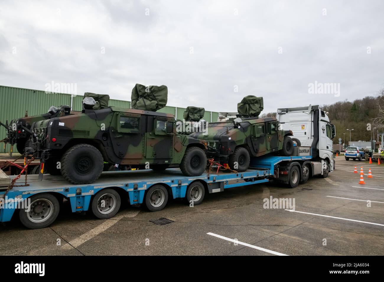 Four Humvees are ready to leave the Army Prepositioned Stock site in ...