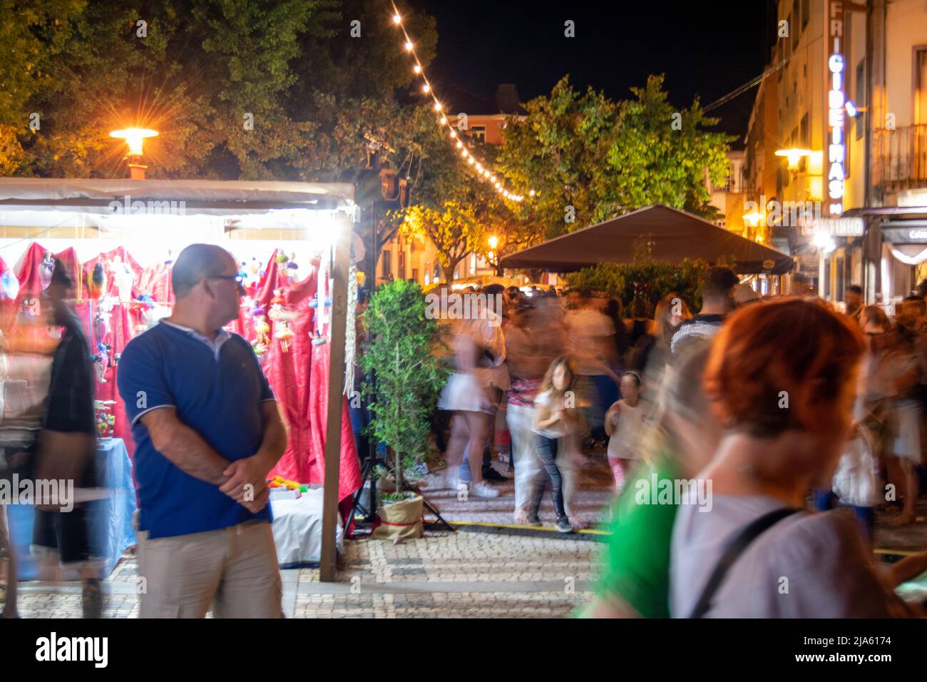 Social events at night, people enjoying the summer nights. People ...