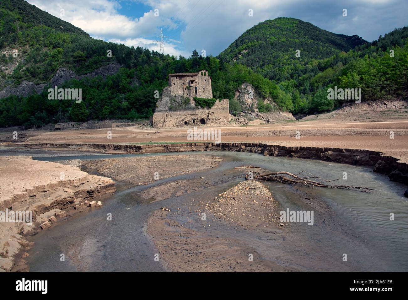 SWAMP WITH VERY LOW WATER LEVEL WITH AN OLD CONSTRUCTION IN THE ...
