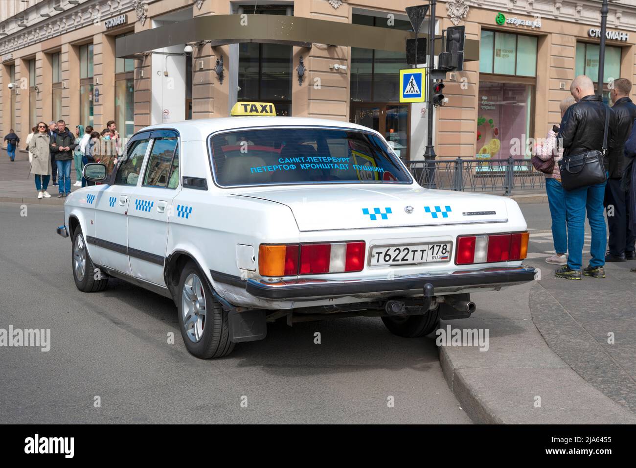 SAINT PETERSBURG, RUSSIA - MAY 23, 2022: Old taxi car "Volga" GAZ-3102 ...
