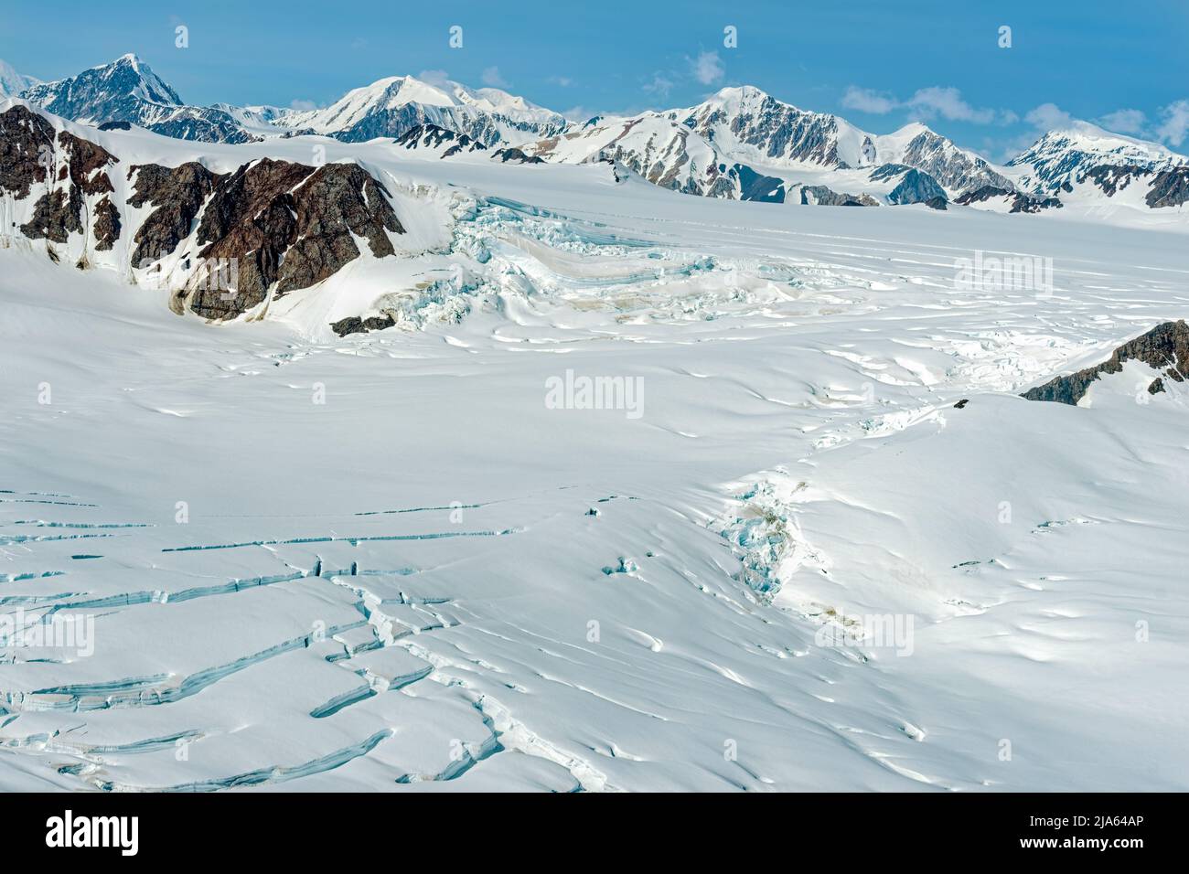 Mountains rising from the icefields of Kluane National Park, Yukon ...