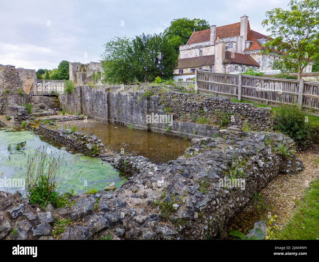 Water stands in the ancient ruins of historic Wolvesey Castle next to ...