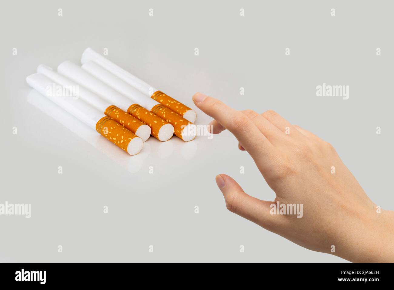 hand showing cigarette, close up Stock Photo - Alamy
