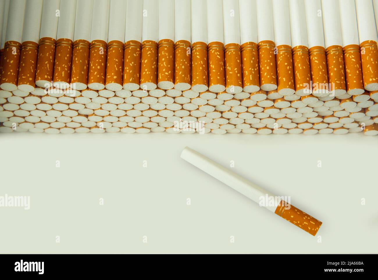 cigarettes stack on isolated white background, top view Stock Photo - Alamy