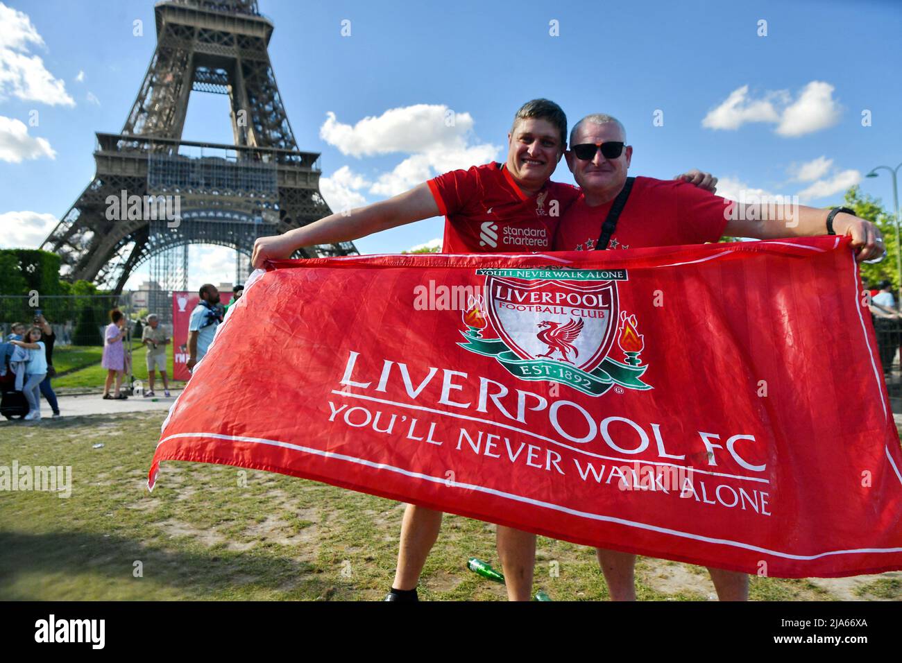Liverpool FC's fans dance and drink near the Eiffel Tower in Paris ...
