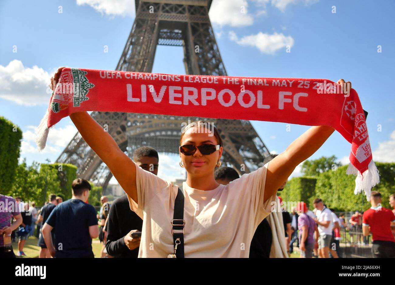 Liverpool FC's fans dance and drink near the Eiffel Tower in Paris ...