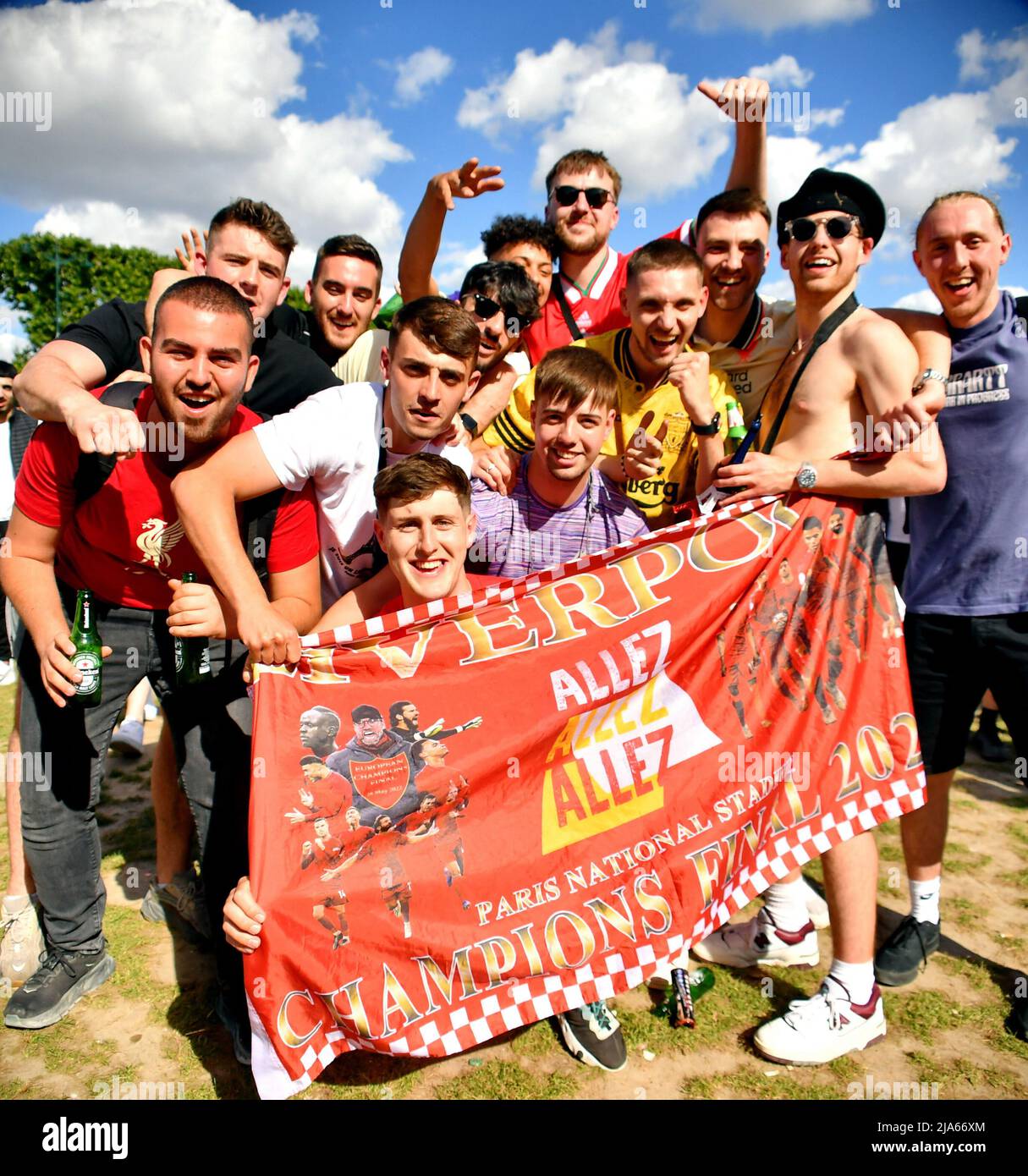 Liverpool FC's fans dance and drink near the Eiffel Tower in Paris ...