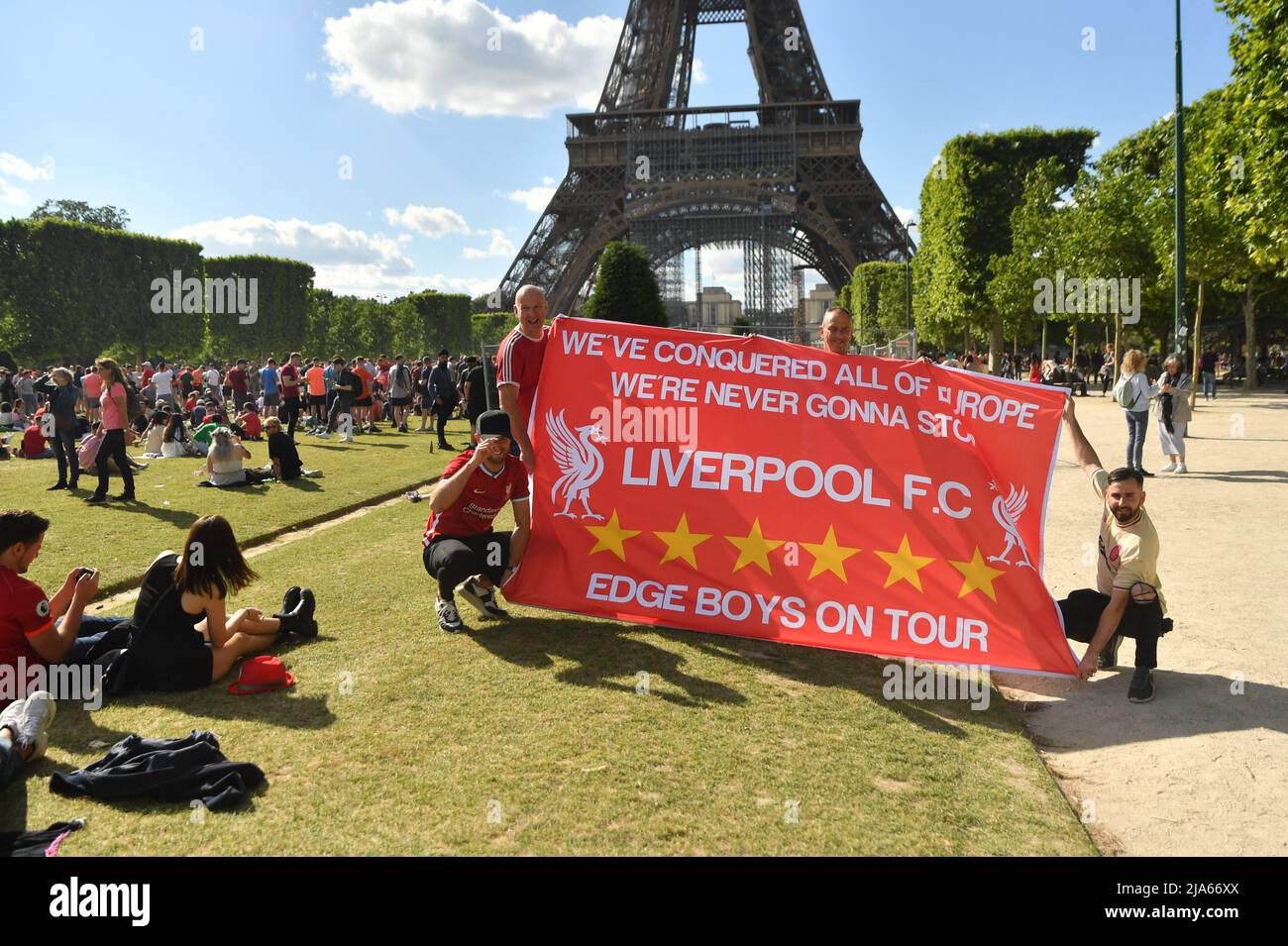 Liverpool FC's fans dance and drink near the Eiffel Tower in Paris ...