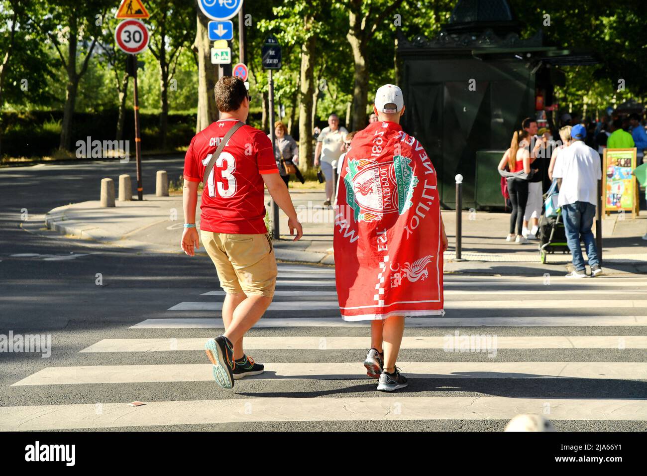 Liverpool FC's fans dance and drink near the Eiffel Tower in Paris ...