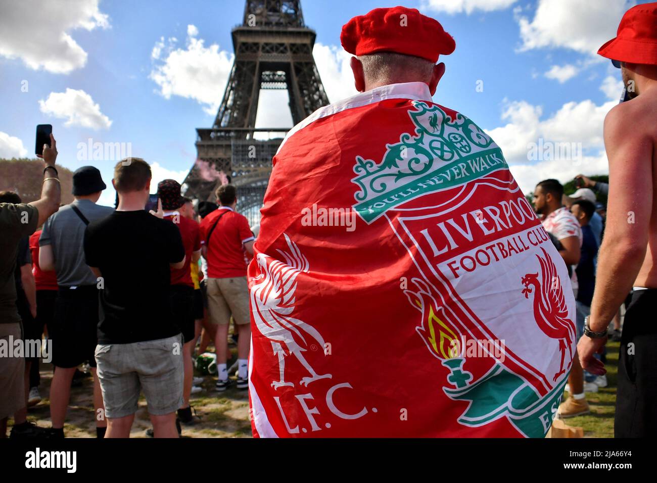 Liverpool FC's fans dance and drink near the Eiffel Tower in Paris ...