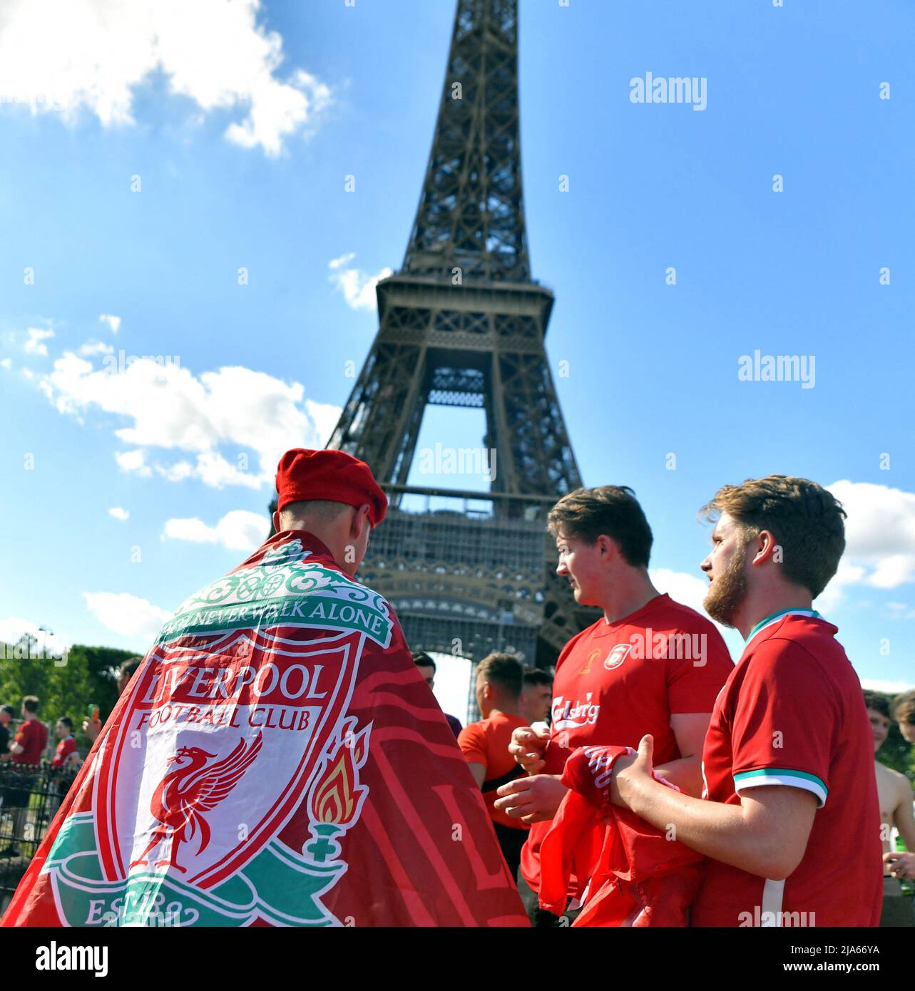 Liverpool FC's fans dance and drink near the Eiffel Tower in Paris ...