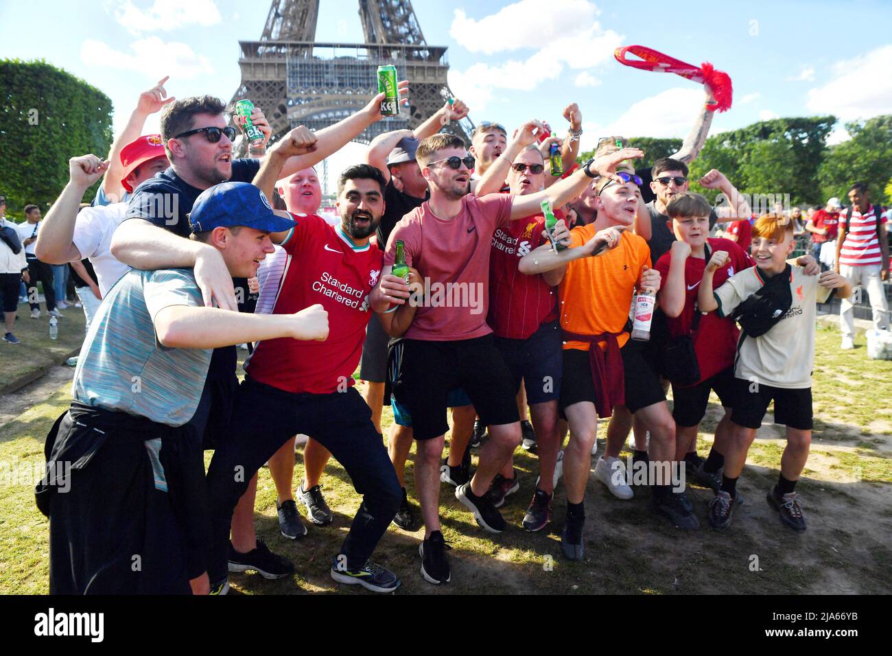 Liverpool FC's fans dance and drink near the Eiffel Tower in Paris ...
