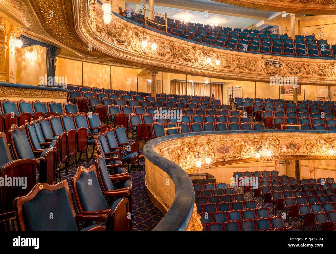 Rows of blue plush seats of the Grand Theatre in Blackpool, Lancashire ...