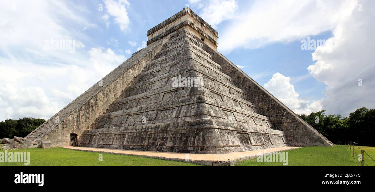 Temple of Kukulcan El Castillo in the center of the archaeological site, panoramic shot closeup ...