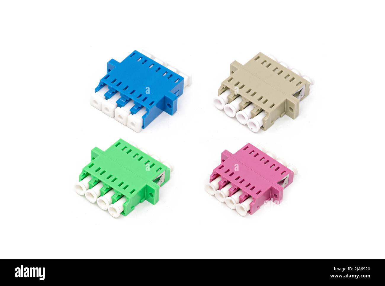 Quad fiber optic adapter on isolated white background Stock Photo - Alamy