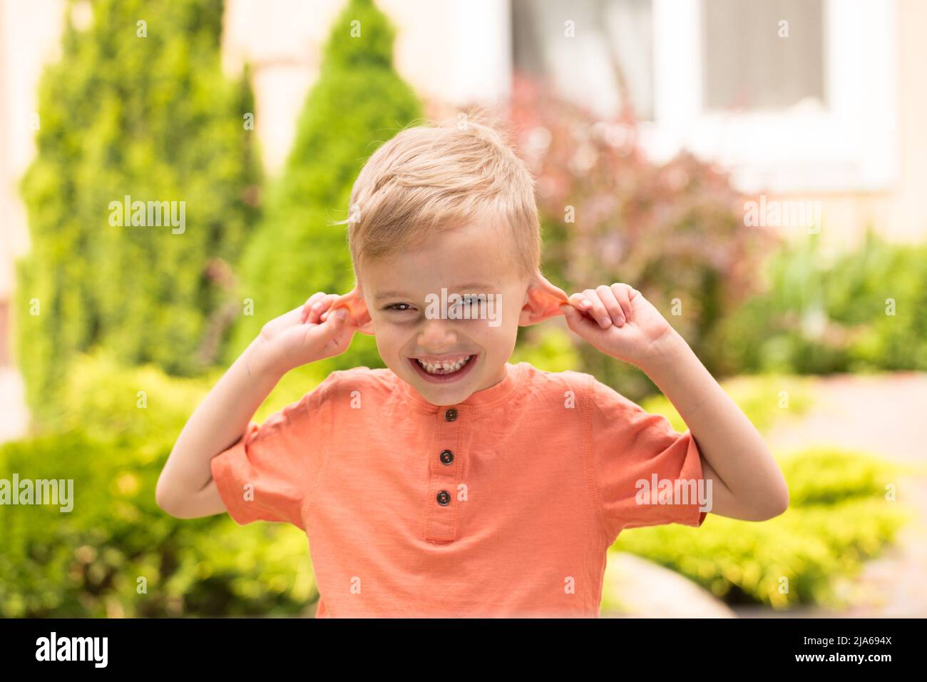 Five year old Boy Making Faces A Five year old Blond Boy Makes Faces five-year-old-boy-making-faces-a-five-year-old-blond-boy-makes-faces