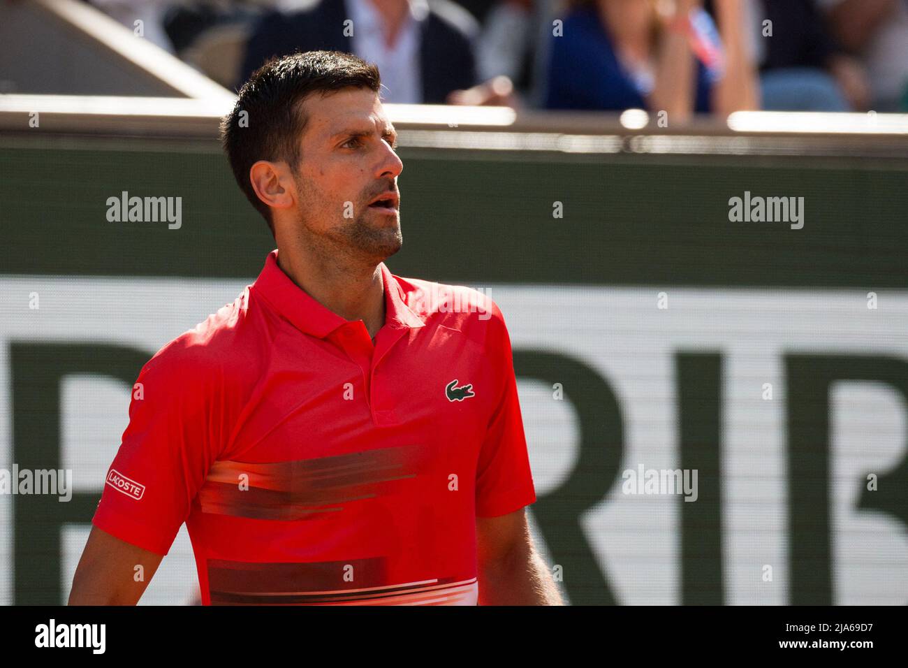 Novak Djokovic playing during French Open Tennis at Roland Garros arena ...