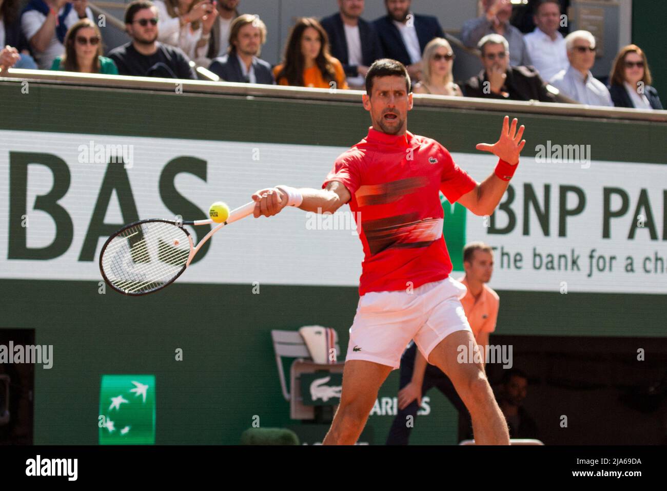 Novak Djokovic playing during French Open Tennis at Roland Garros arena ...