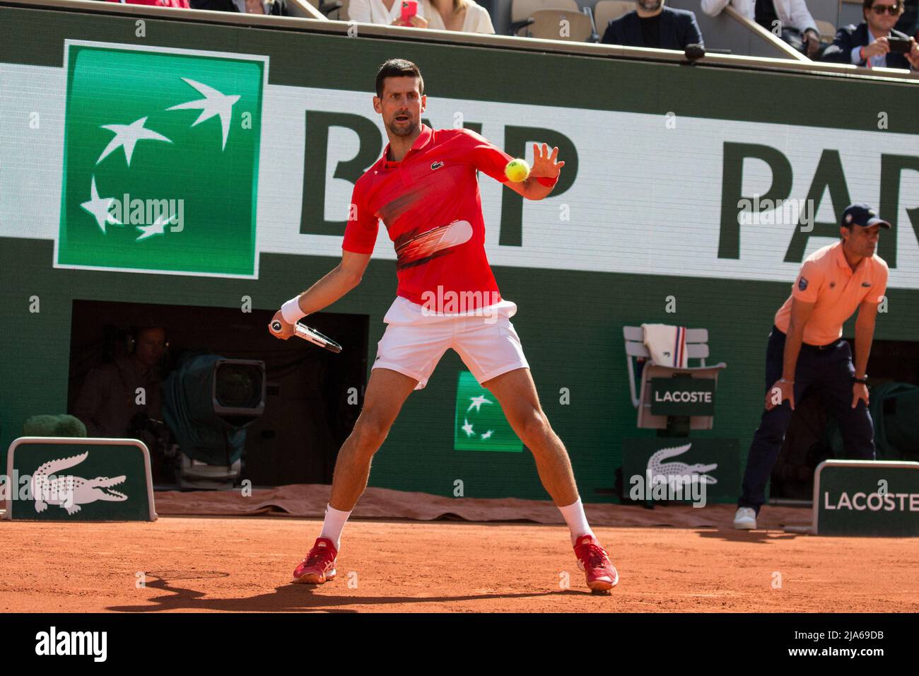 Novak Djokovic playing during French Open Tennis at Roland Garros arena ...