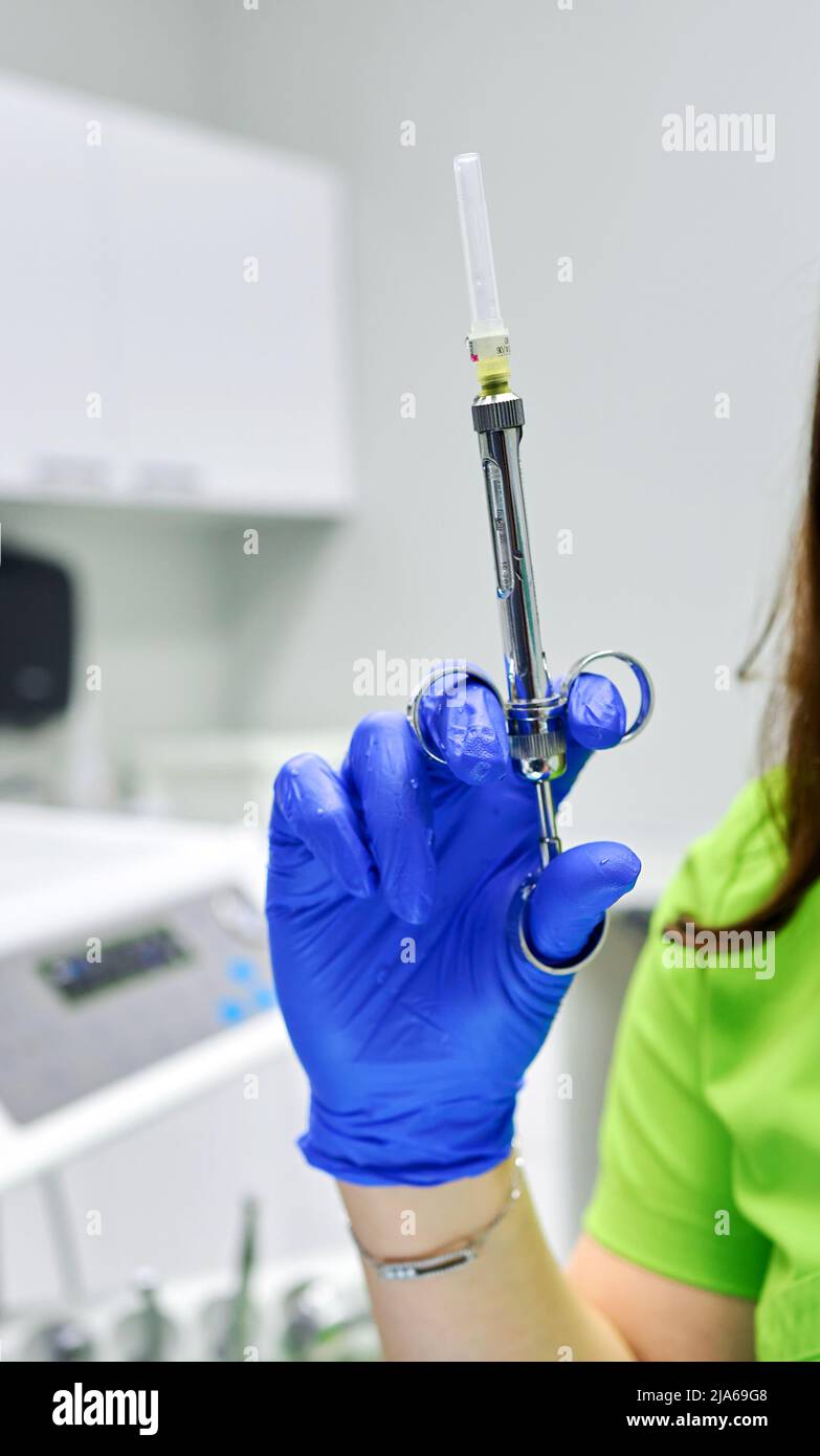 Female dentist injection needle anesthesia hi-res stock photography and ...