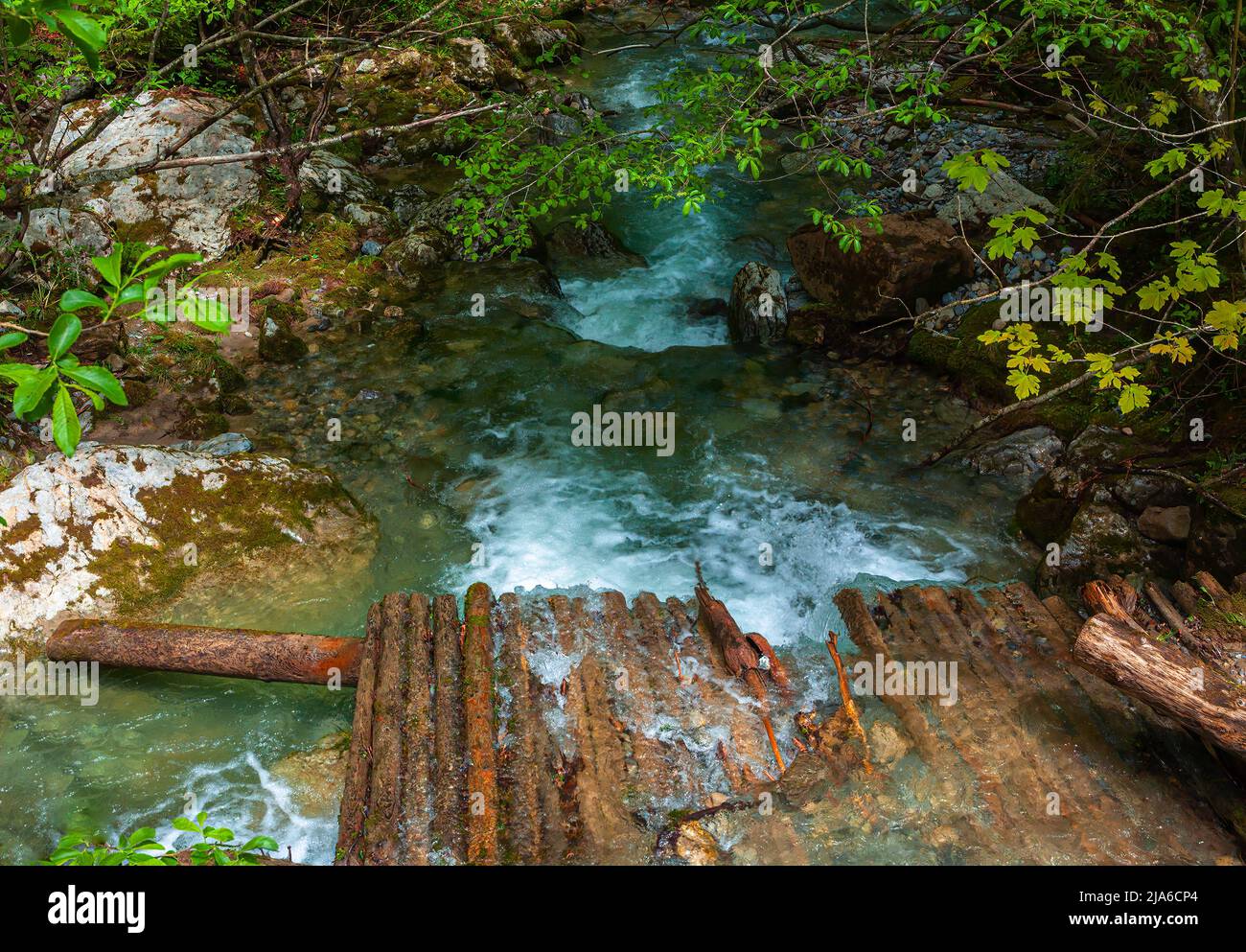 Water well in the rocks of Ahorn in the beautiful swiss mountain region ...